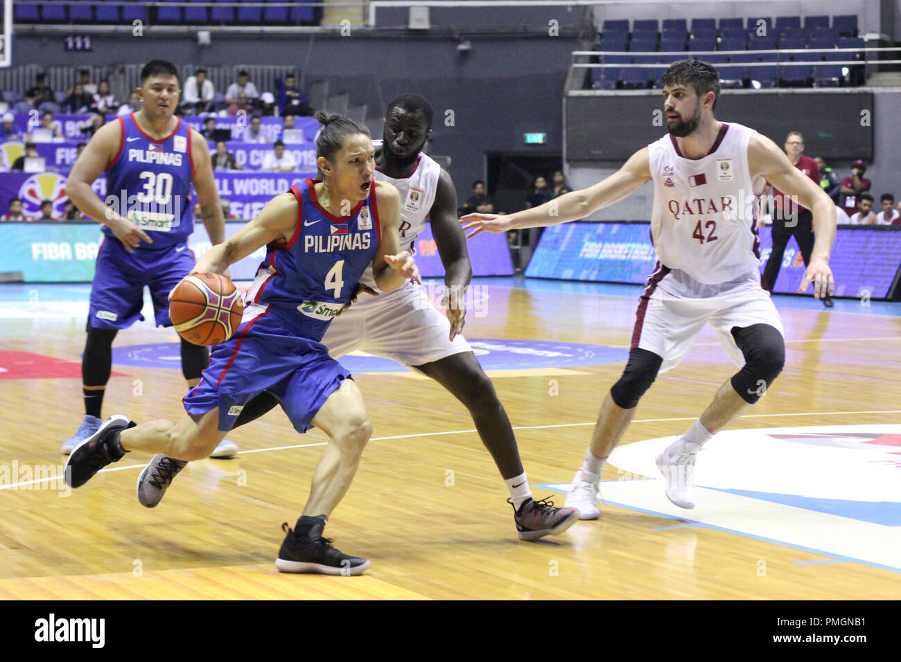 Quezon City, Philippines. 17th Sep, 2018. Ale Cabagnot (Blue) of the ...