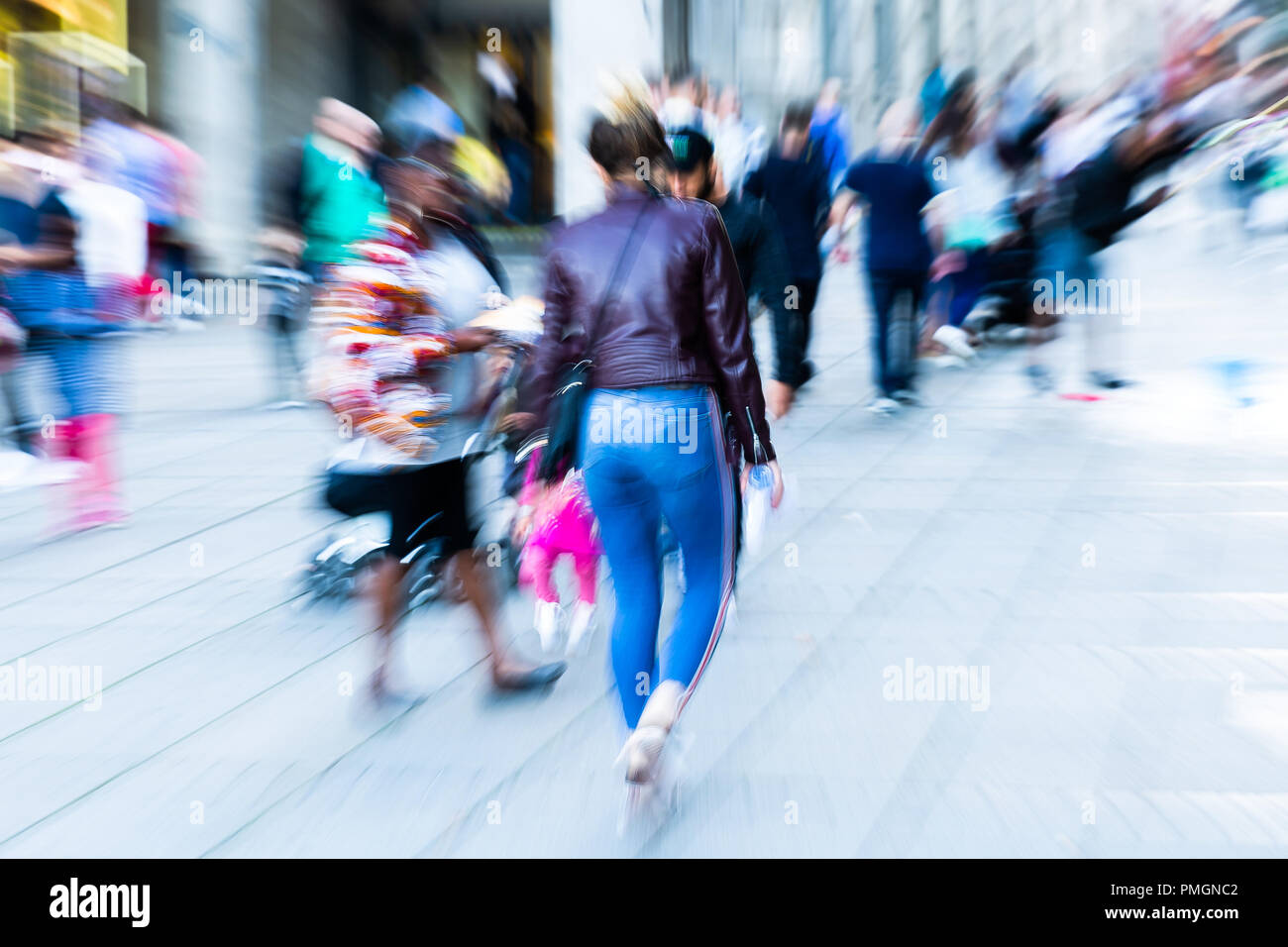 creative camera made zoom picture of people walking in the city Stock ...