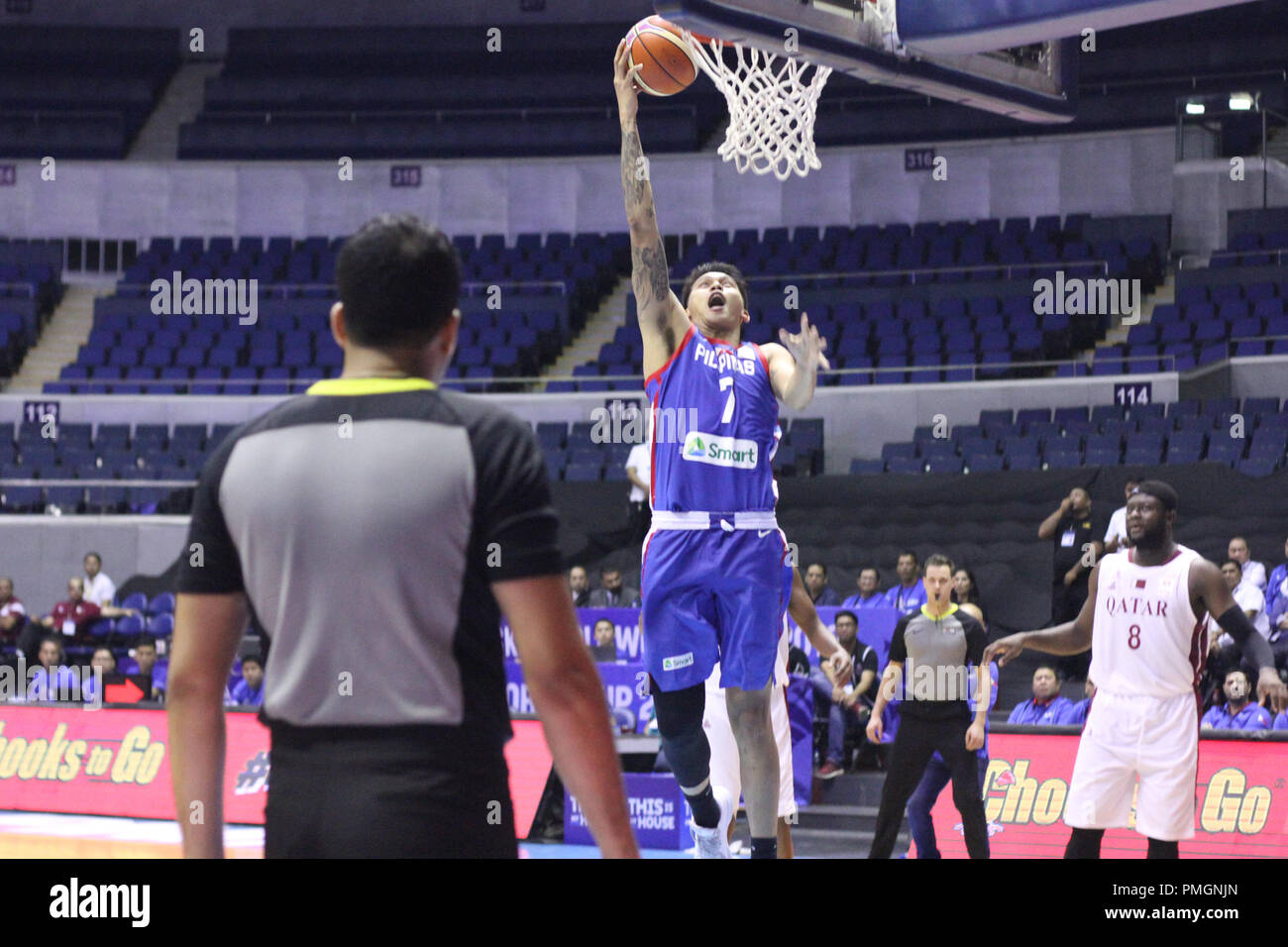 Quezon City, Philippines. 17th Sep, 2018. Poy Erram (Blue) of the ...