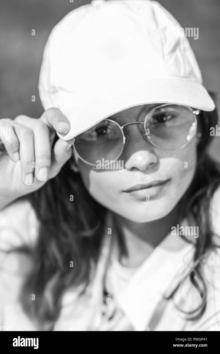 Black white portrait of a young beautiful brunette woman with rounded ...