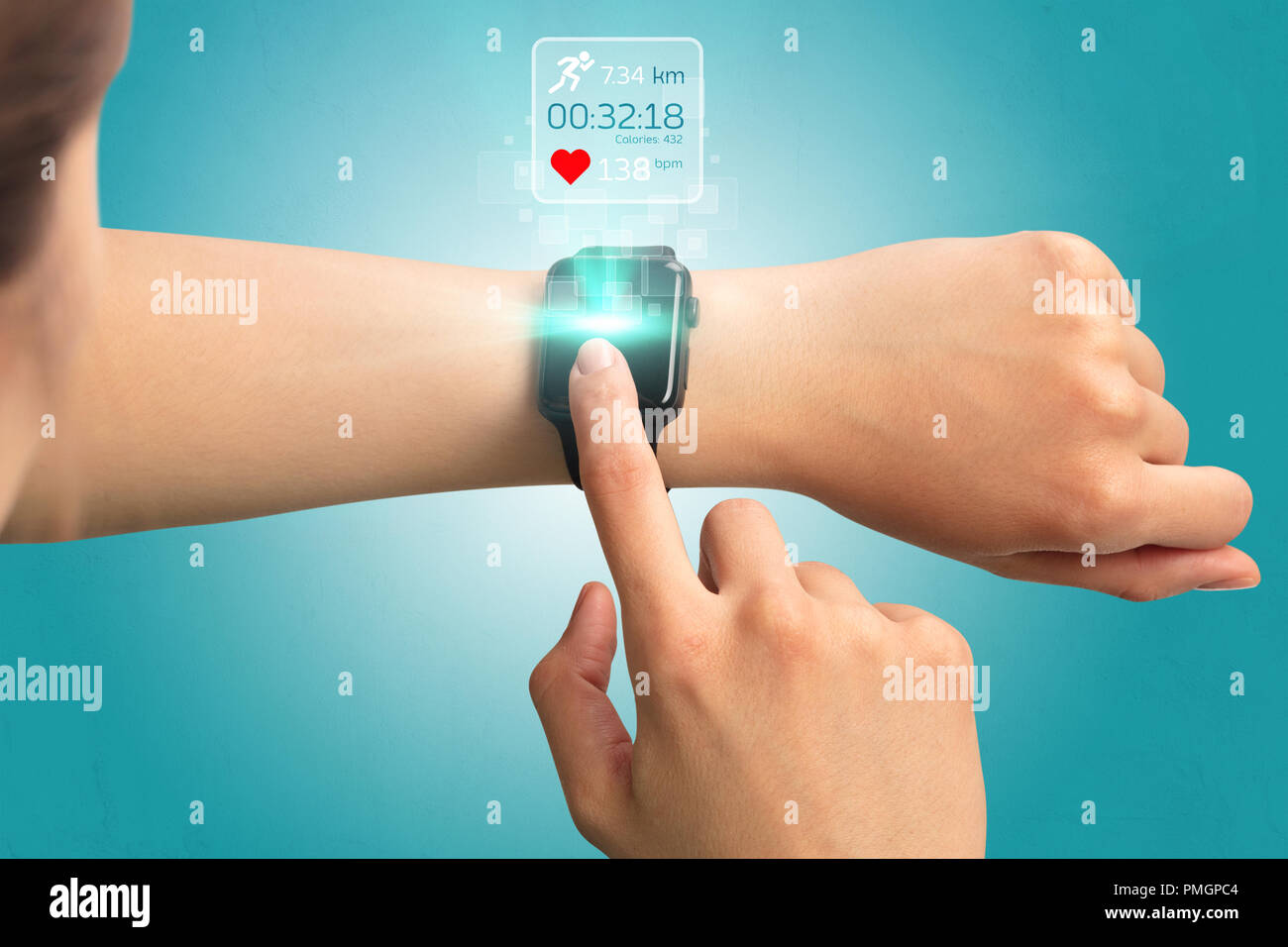 Female hand with smartwatch and running concept above Stock Photo - Alamy