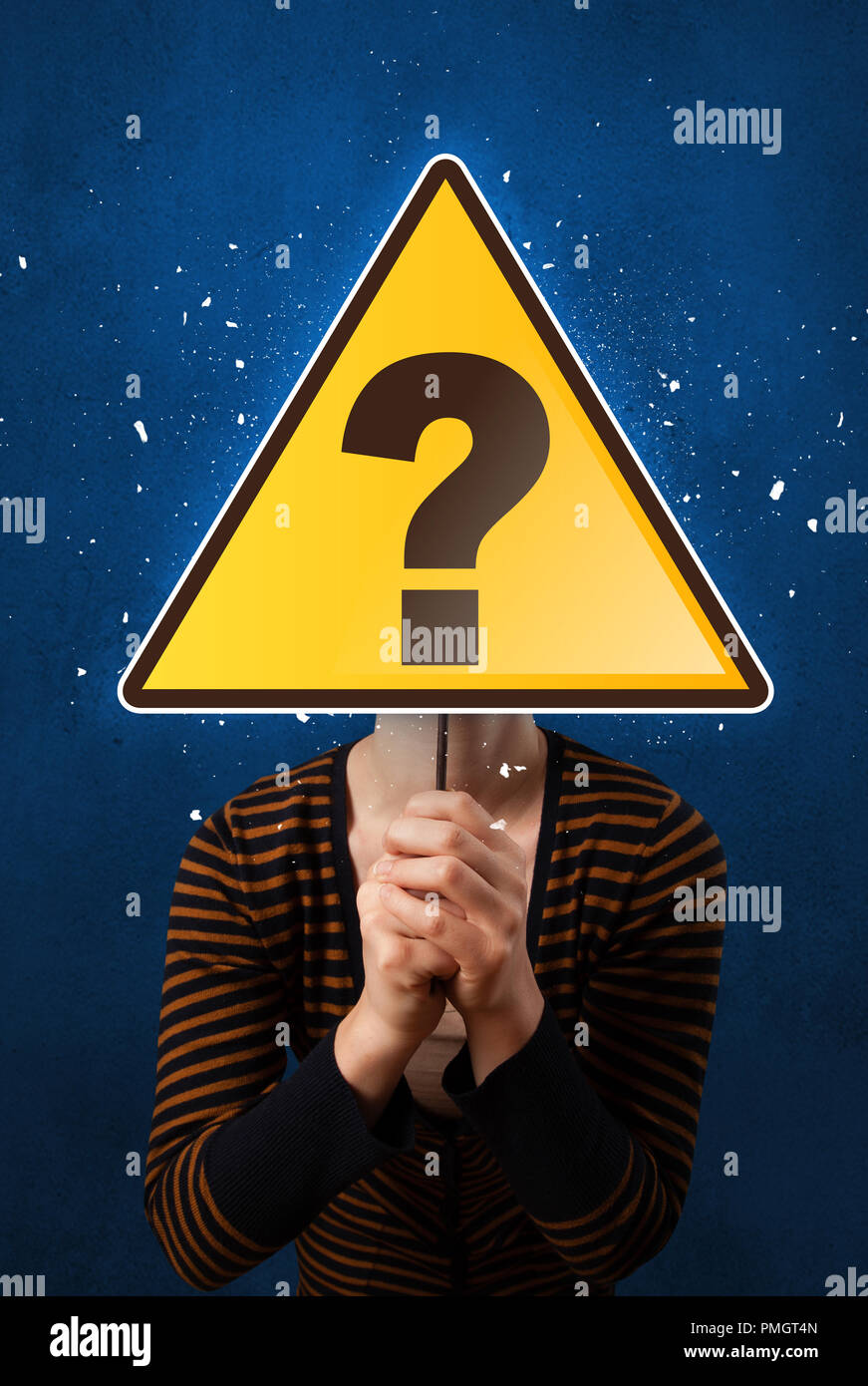 Casual young woman holding yellow sign with question mark Stock Photo ...