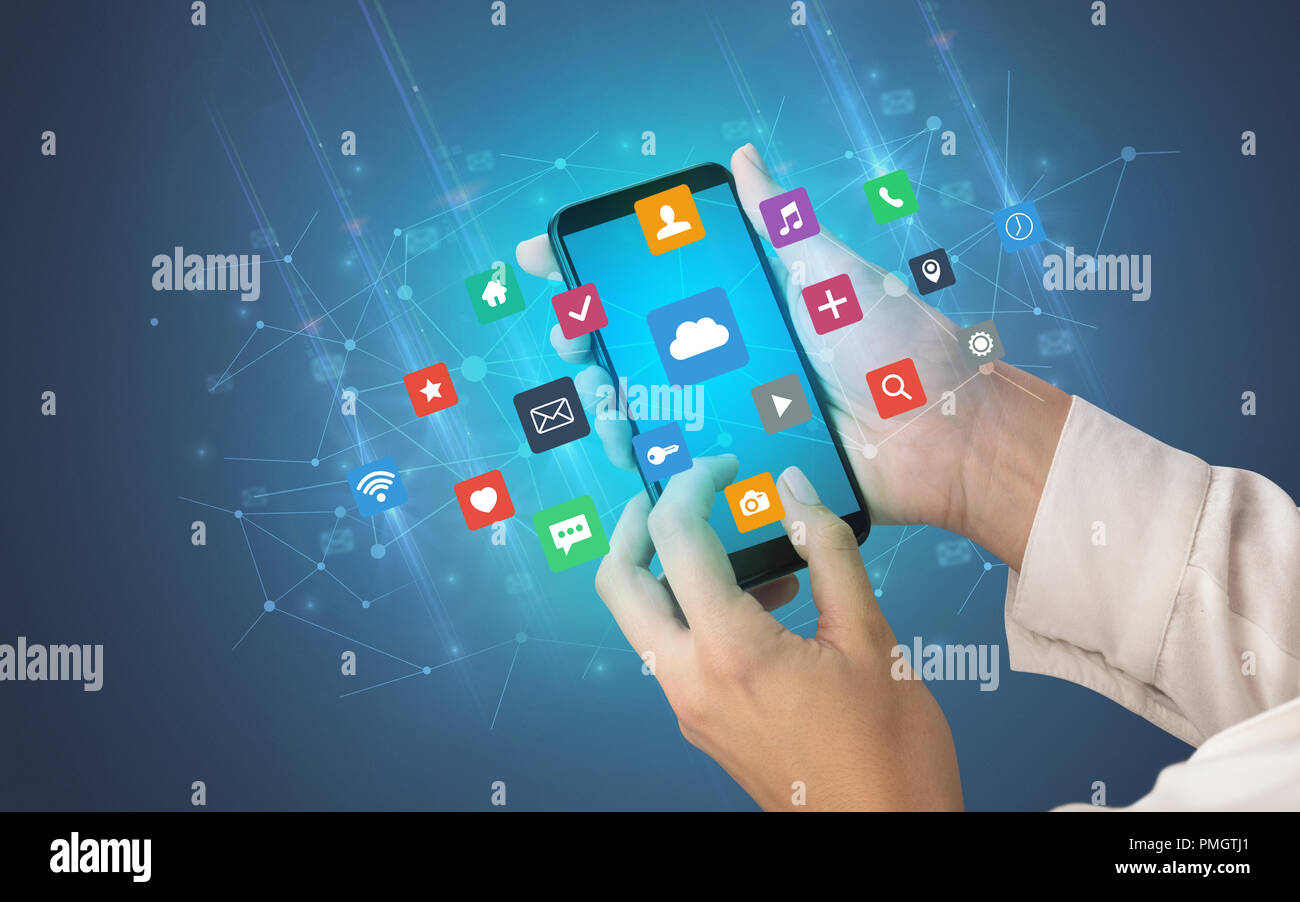 Female hand using smartphone with colorful application icons around ...