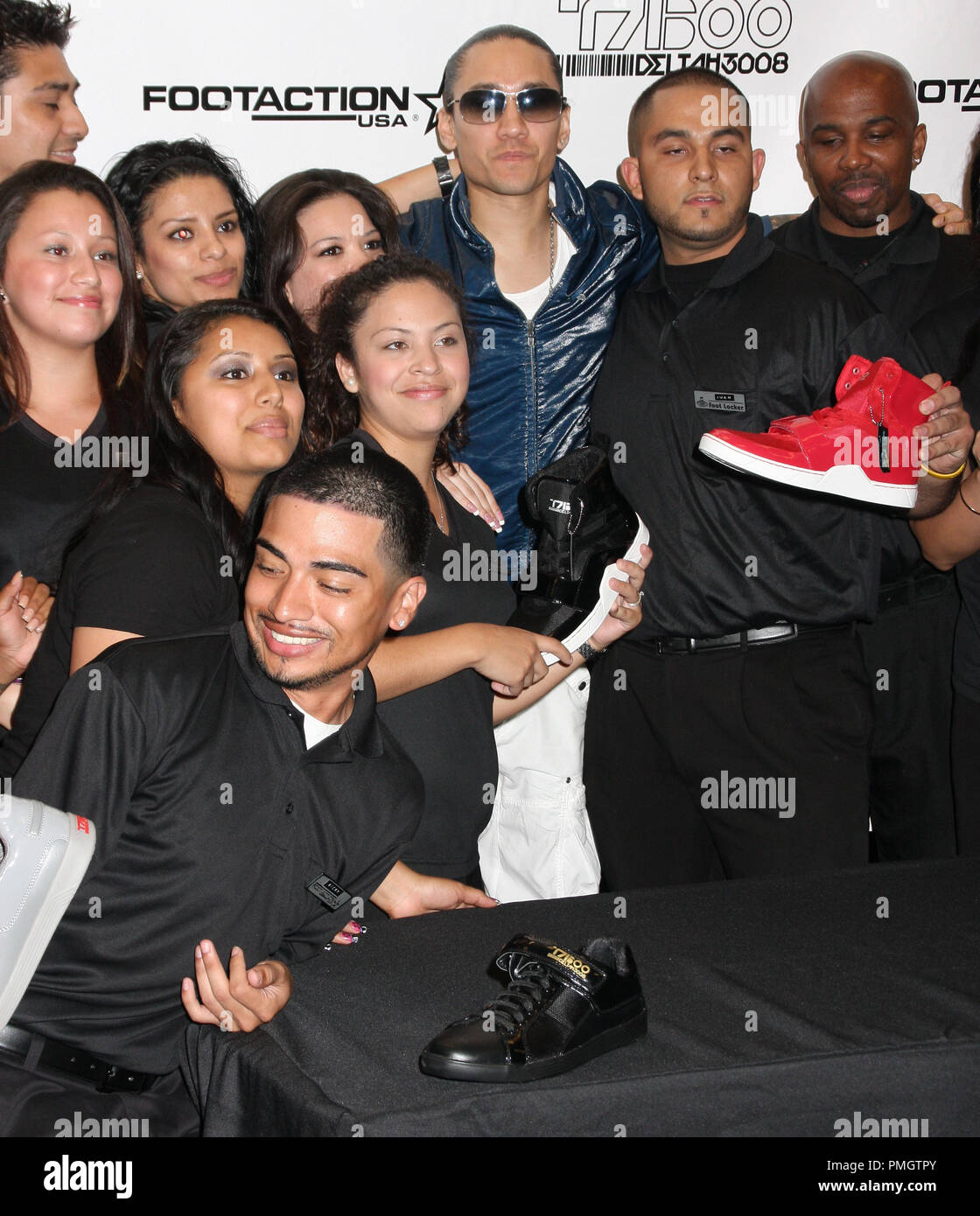 Taboo (center) and the FootAction Staff at the Taboo Deltah 3008 meet ...