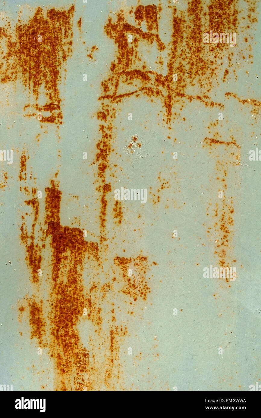 Abstract shapes of rust streaks on a painted metal outbuilding door Stock Photo - Alamy