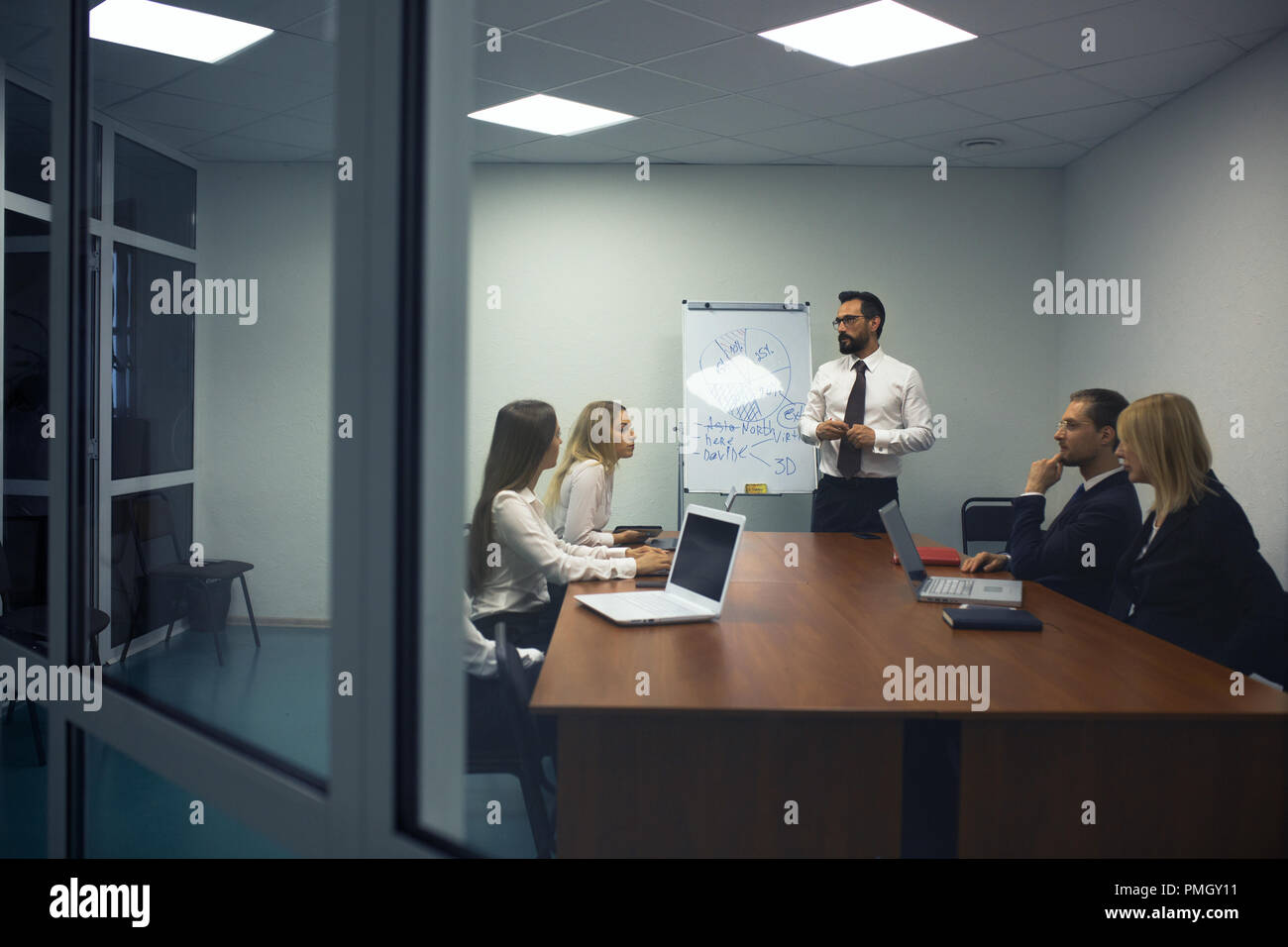 Business man making a presentation in office Stock Photo - Alamy