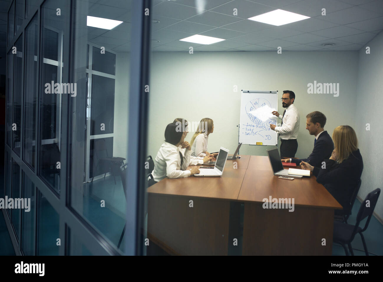 Business man making a presentation in office Stock Photo - Alamy
