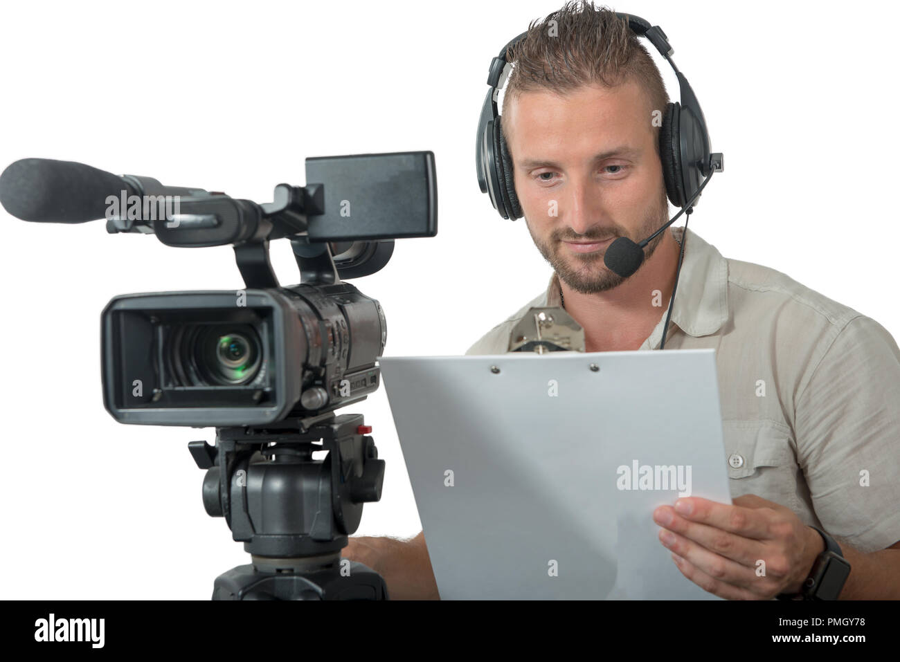 cameraman with professional camcorder and headphones isolated on white ...