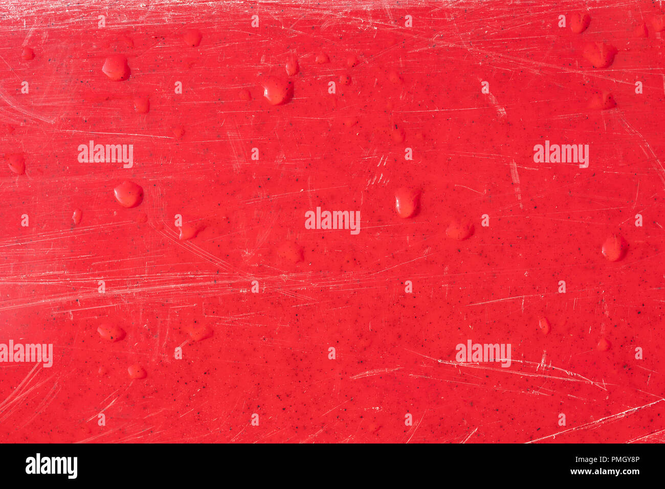 Very close view of the wet surface of a plastic scratched kayak Stock ...