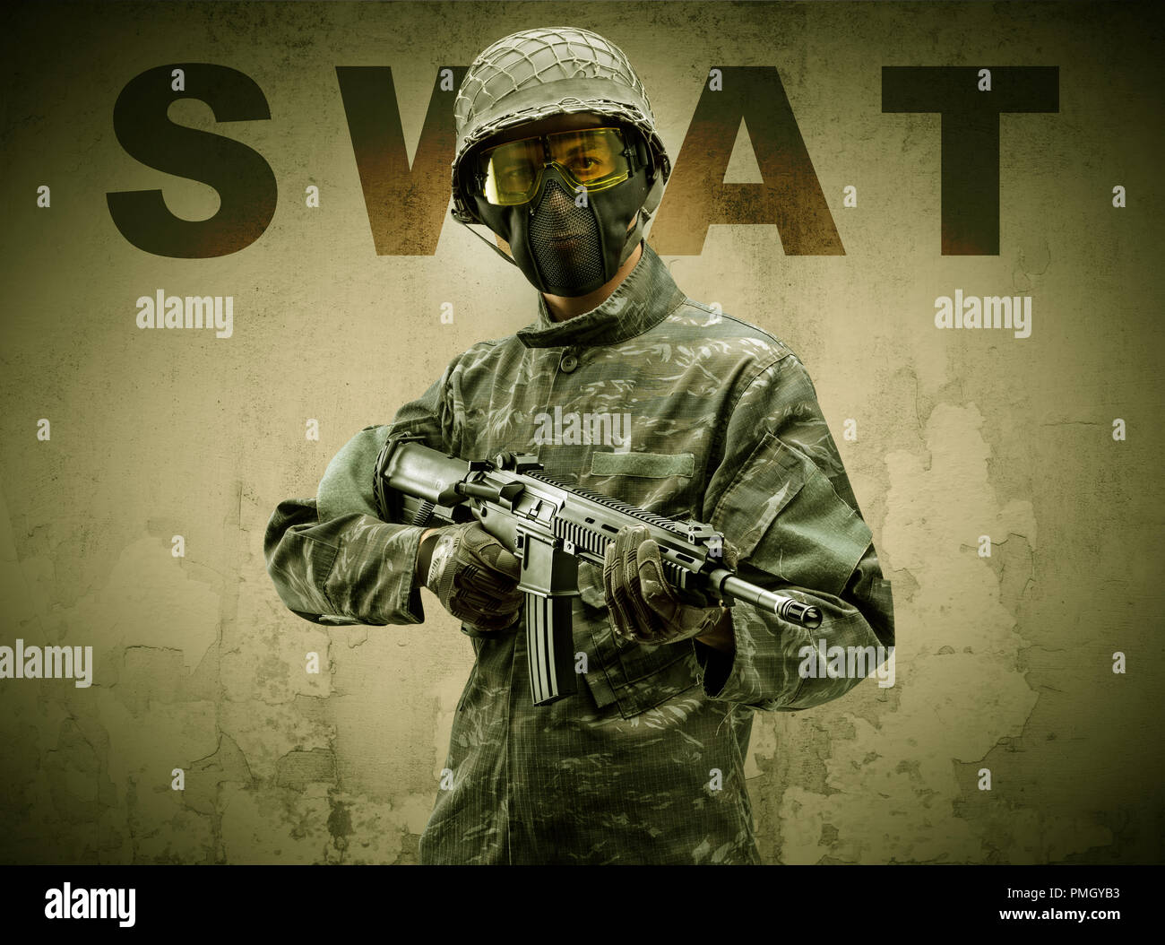 Uniformed armed soldier with damaged wall background Stock Photo - Alamy