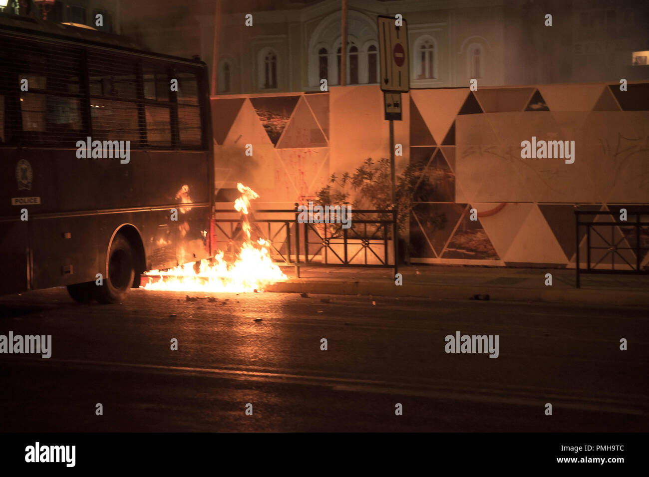 Athens, Greece. 18th Sep, 2018. A bus seen on fire after riots had ...