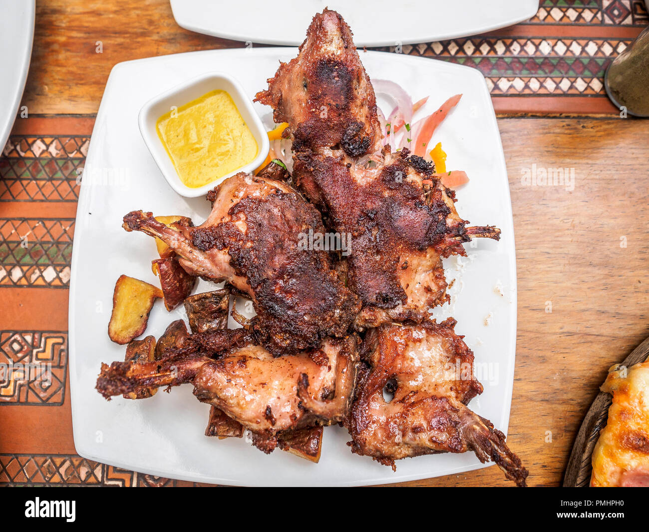 Traditional fried guinea pig, a popular Peruvian cuisine Stock Photo ...