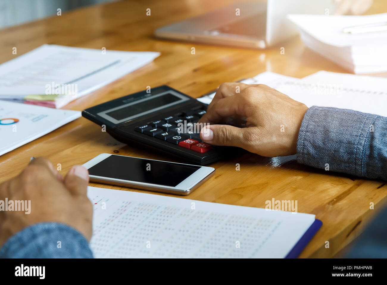 Businessman using calculator to calculate budget, Business concept ...