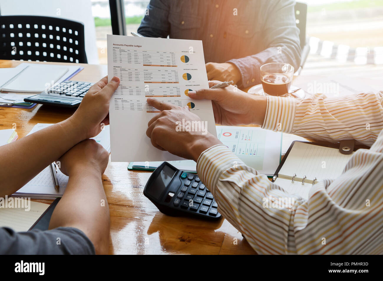 Business team meeting and discussing project plan. Businessmen ...