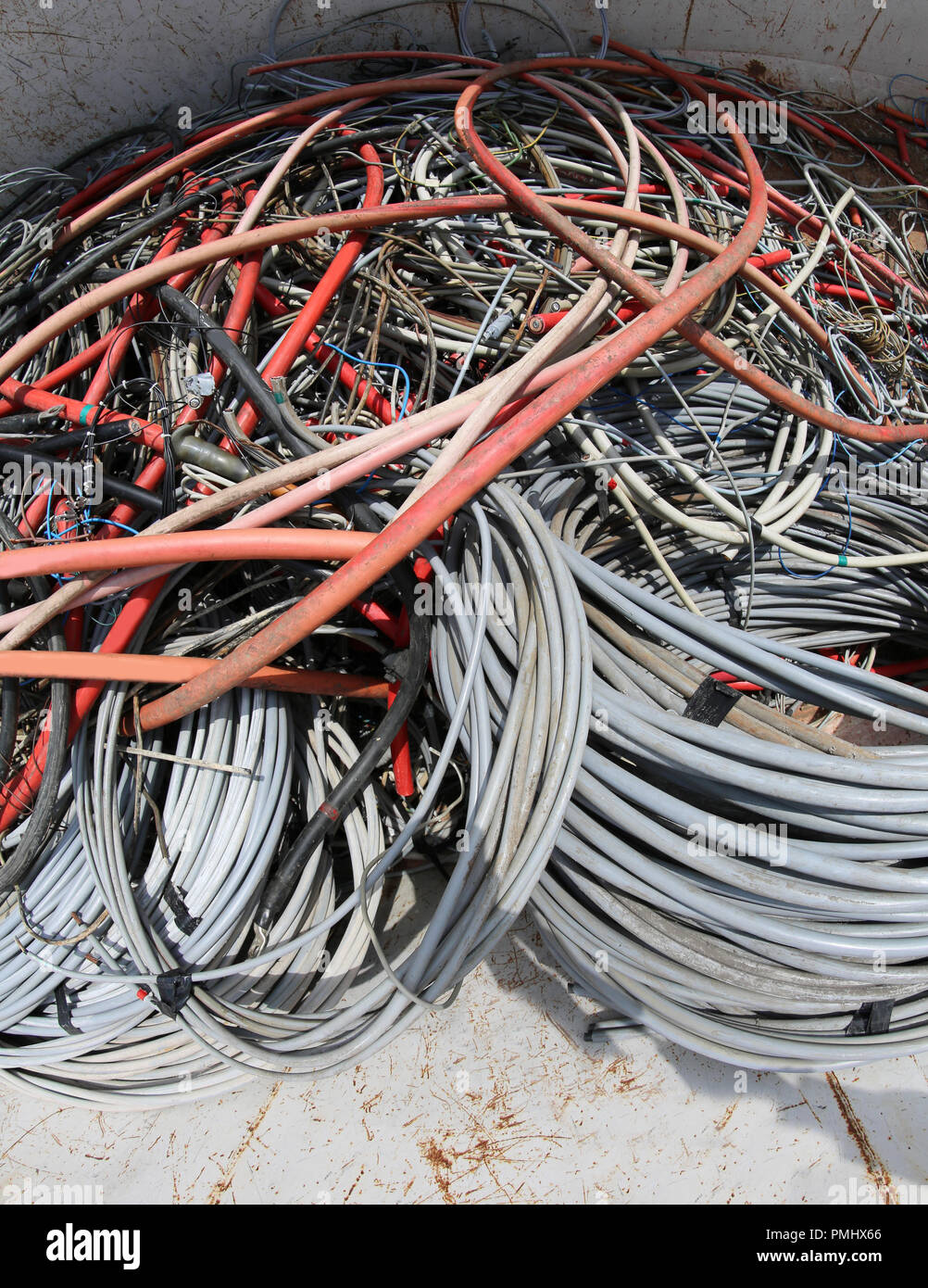 many used electrical cables high voltage and wires in the container ...