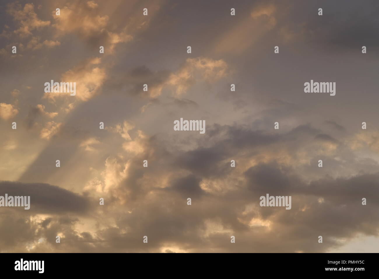 Evening Sky Weather forecast with clouds and sunbeam Stock Photo - Alamy