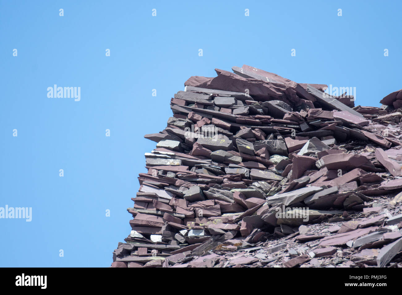 Stacked slate waste at Dinorwig slate mine, near Llanveris Stock Photo ...