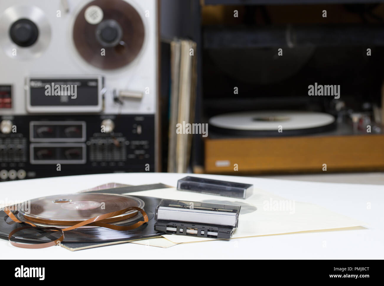 Vinyl record with copy space in front of a collection albums dummy ...
