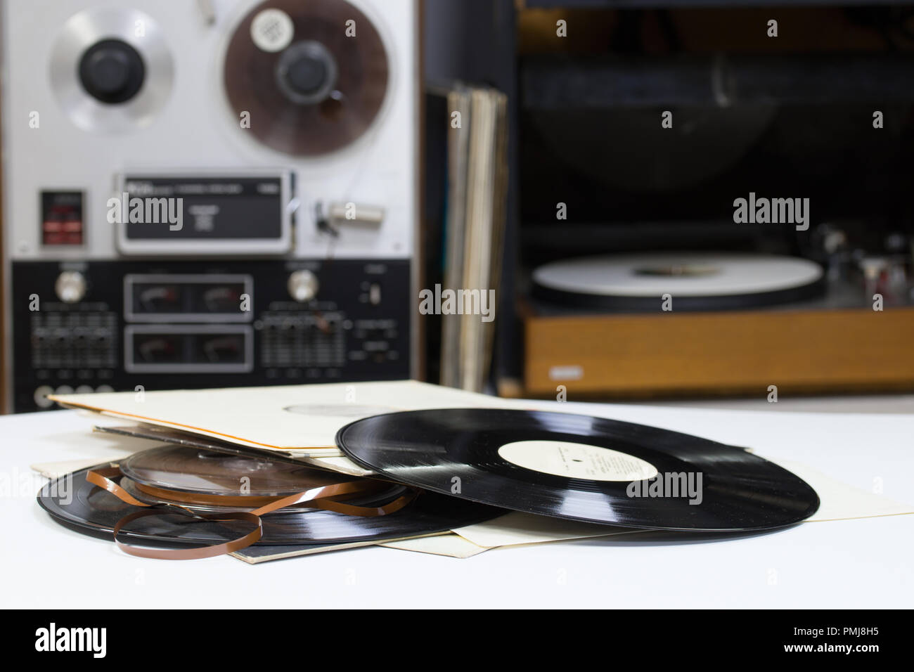 Vinyl record with copy space in front of a collection albums dummy ...