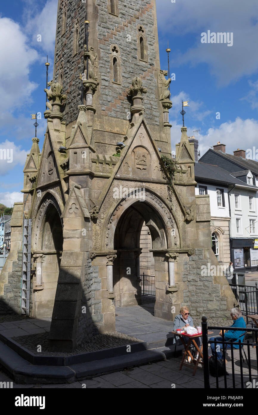 Ladies have tea in afternoon sunshine beneath the clocktower in ...