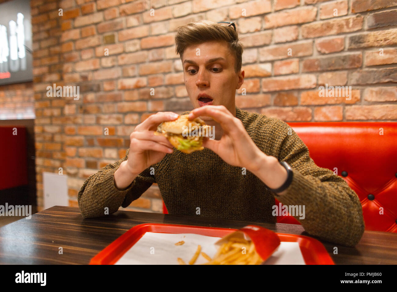 Fat man eating restaurant hi-res stock photography and images - Alamy