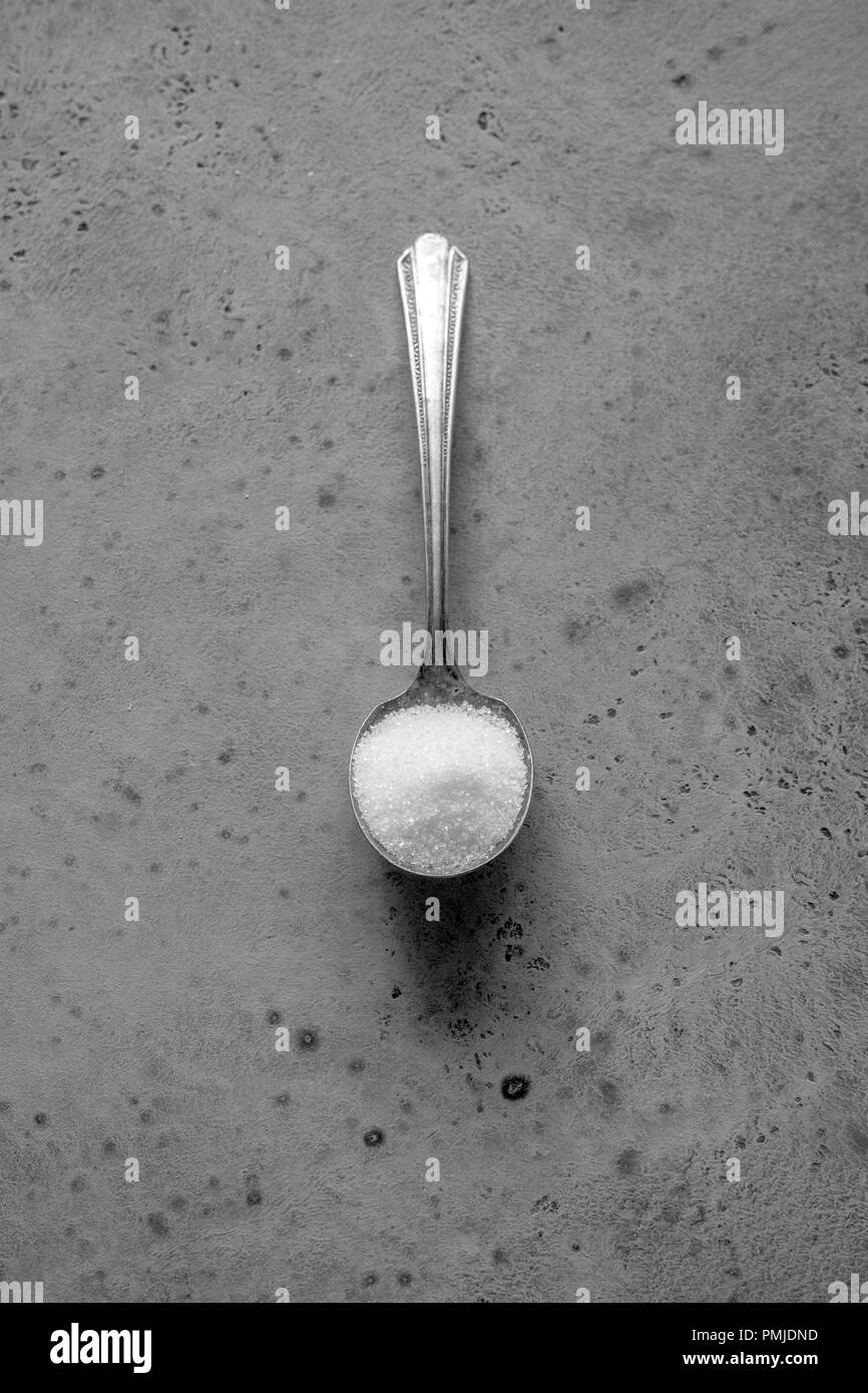 Salt on Spoon Stock Photo - Alamy