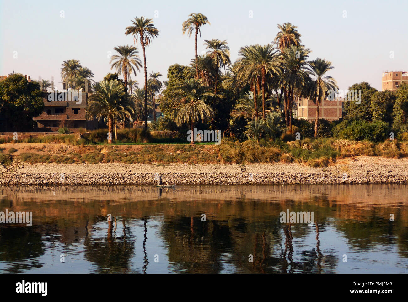 A typical view of a river bank on the River Nile, as viewed from a ...