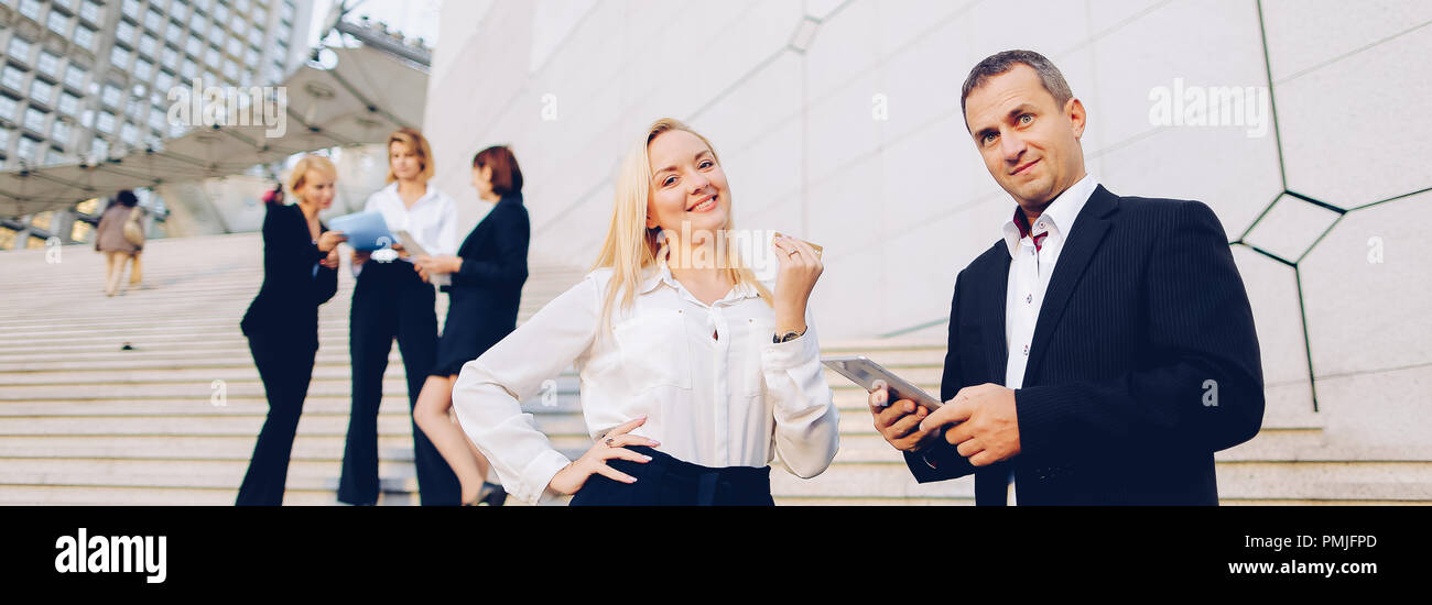 Successful business team walking on stairs in Stock Photo - Alamy