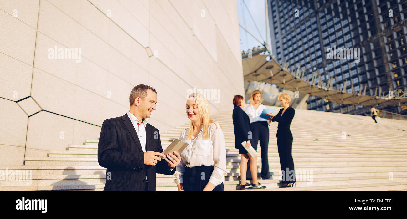 Successful business team walking on stairs in Stock Photo - Alamy
