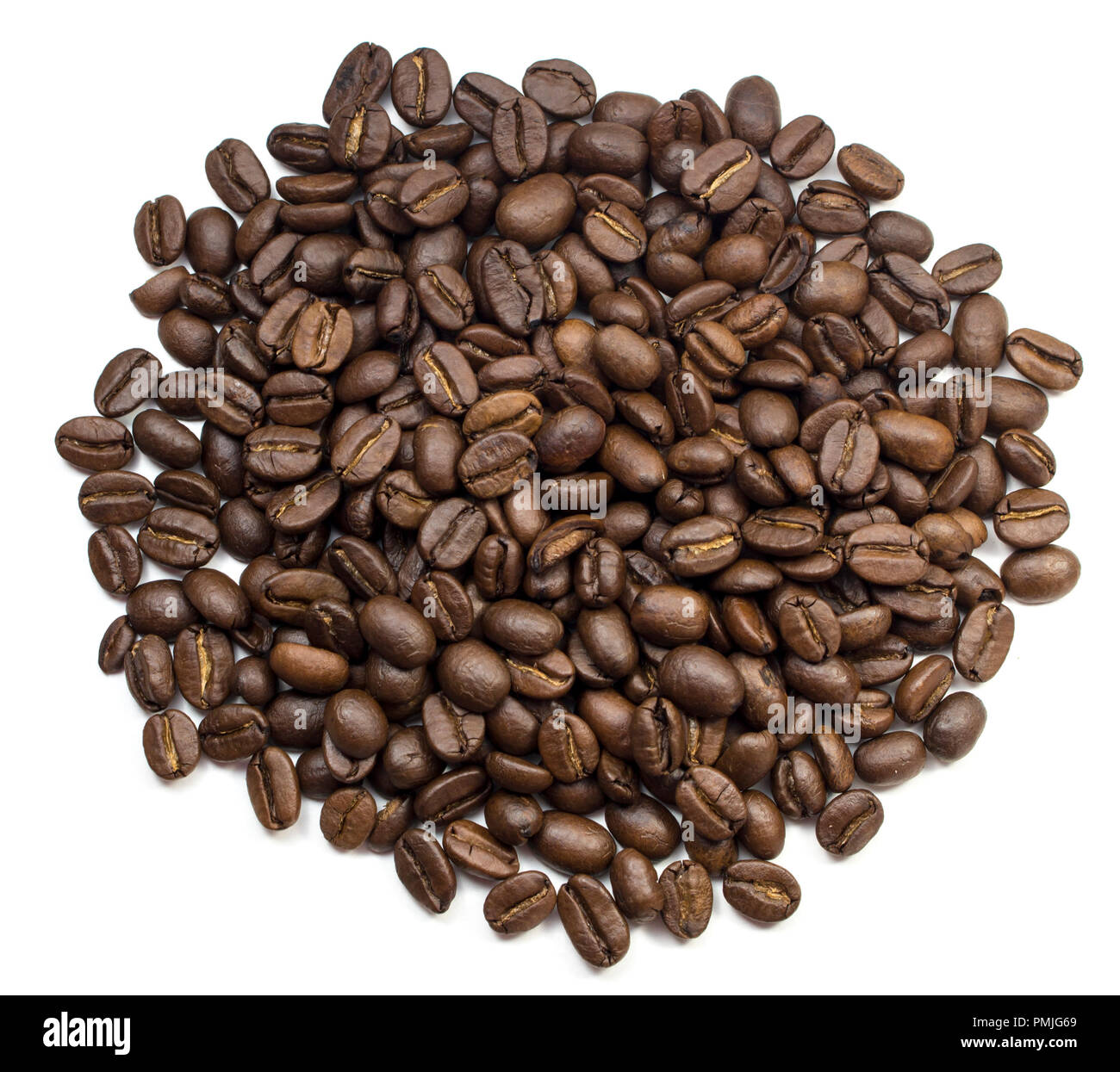 Big pile of roasted coffee beans in white background surface Stock ...
