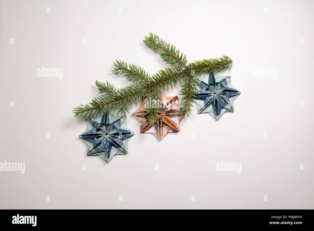 banknotes in the form of snowflakes Stock Photo - Alamy