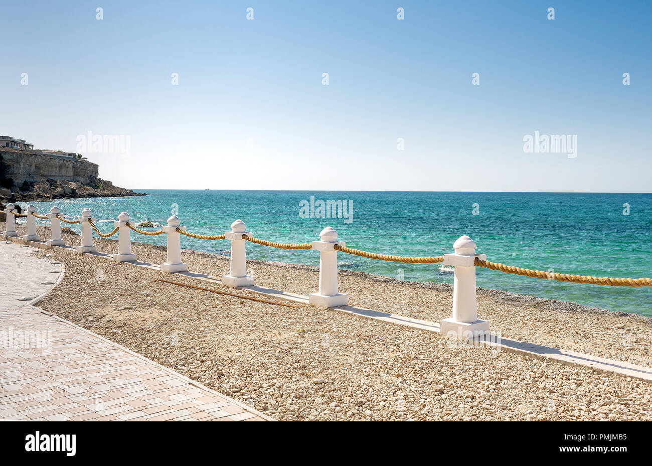 View from the embankment with columns by the sea. Rhythmic line Stock ...