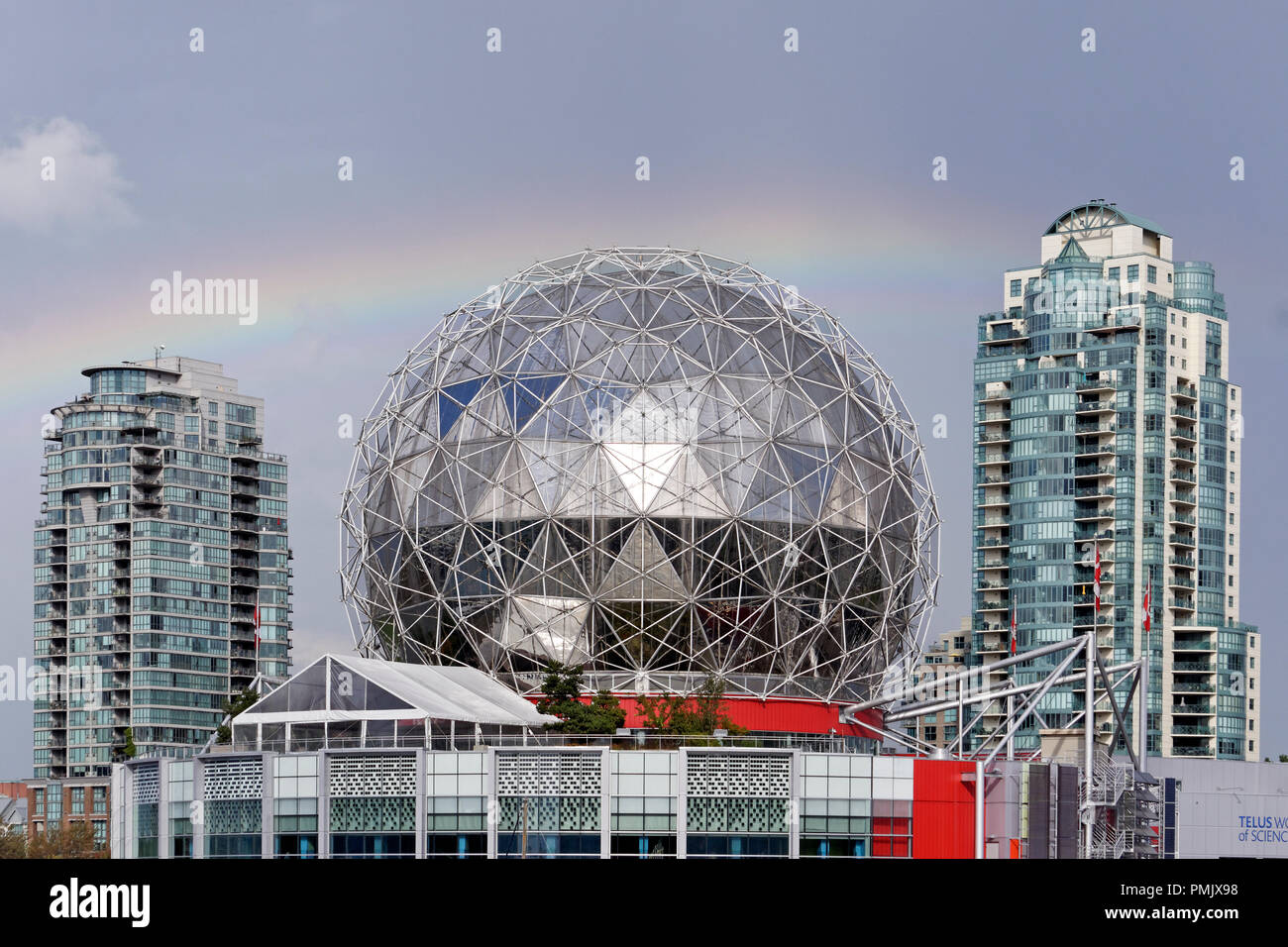 Rainbow over Telus World of Science geodesic dome and high rise ...