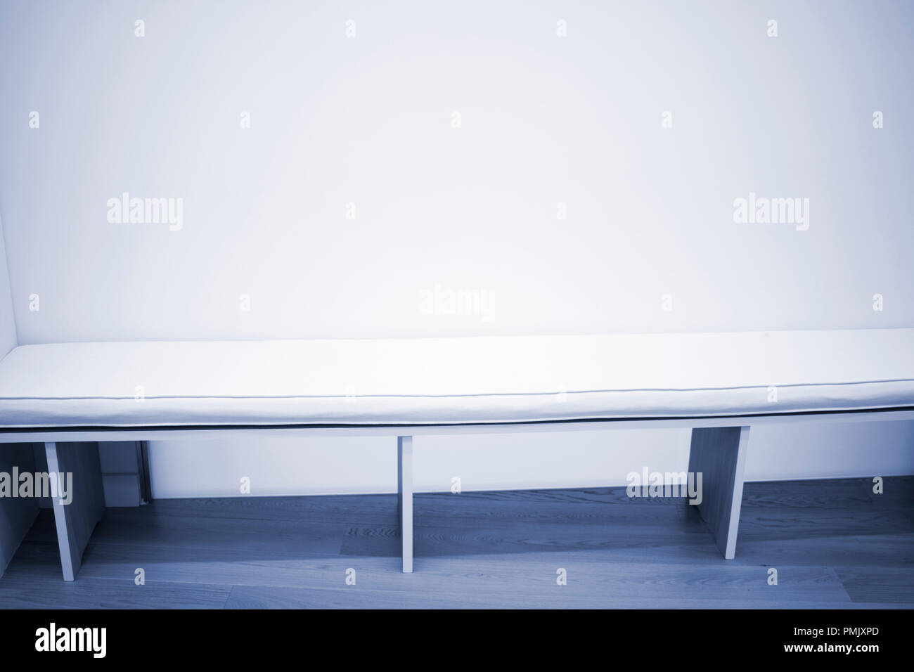 Pilates yoga fitness studio gym room with bench seat waiting and ...