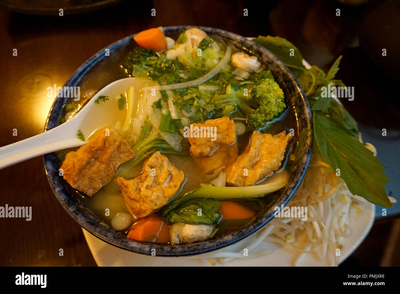 Close-up of a bowl of Vietnamese vegetarian and vegan pho with tofu ...