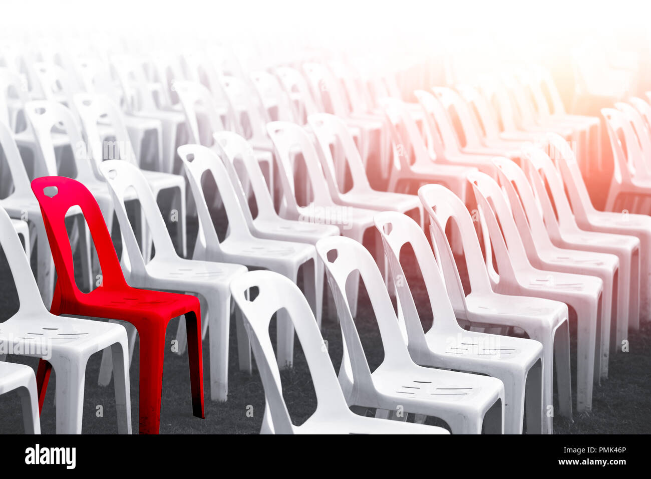 difference red color chair around with many white chairs for unique ...