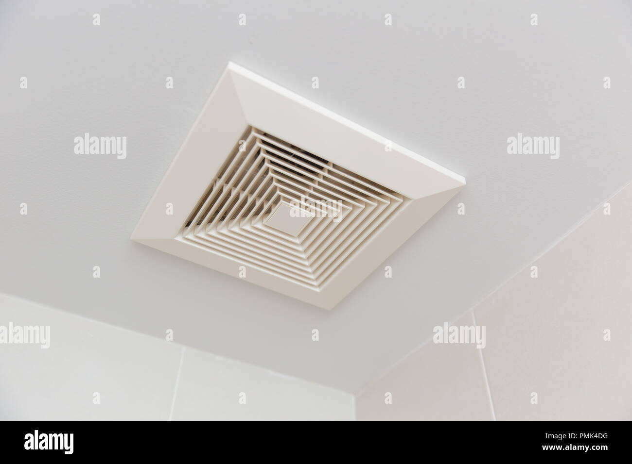 Air ventilation moisture duct in bathroom pipe hole at ceiling Stock ...