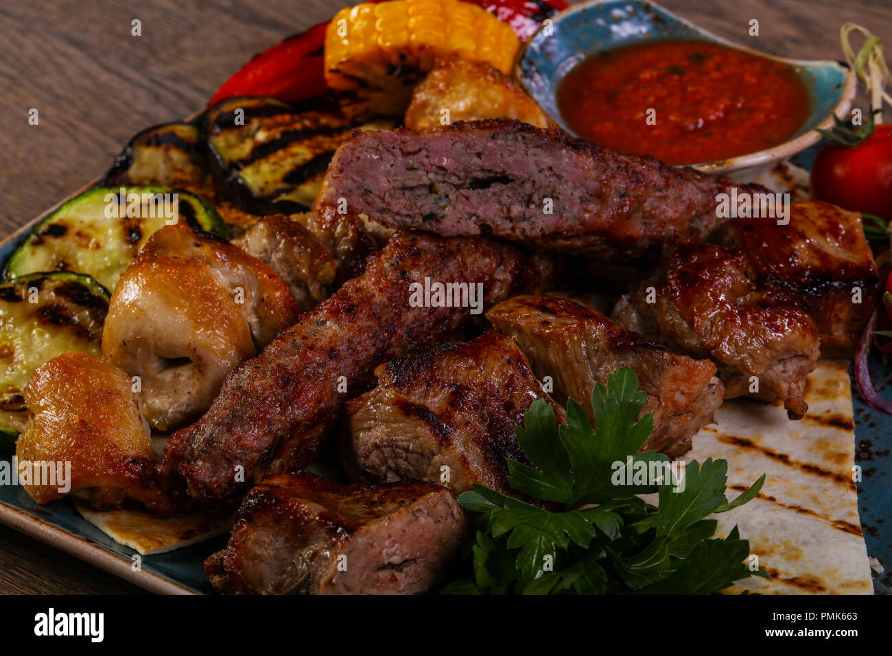 Grilled plate mix assortment meat Stock Photo - Alamy