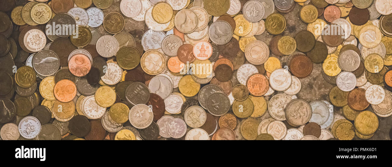 Different coins hi-res stock photography and images - Alamy
