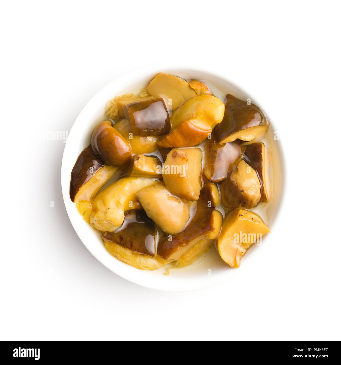 Pickled mushrooms. Marinated boletus in bowl isolated on white ...