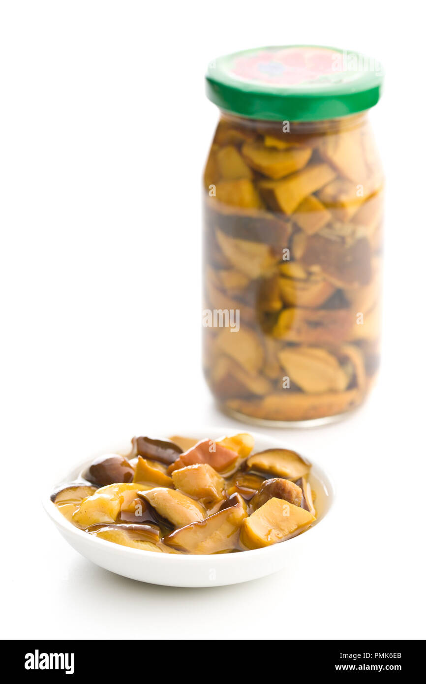 Pickled mushrooms. Marinated boletus in bowl isolated on white ...