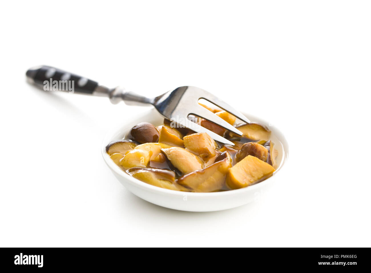 Pickled mushrooms. Marinated boletus in bowl isolated on white ...