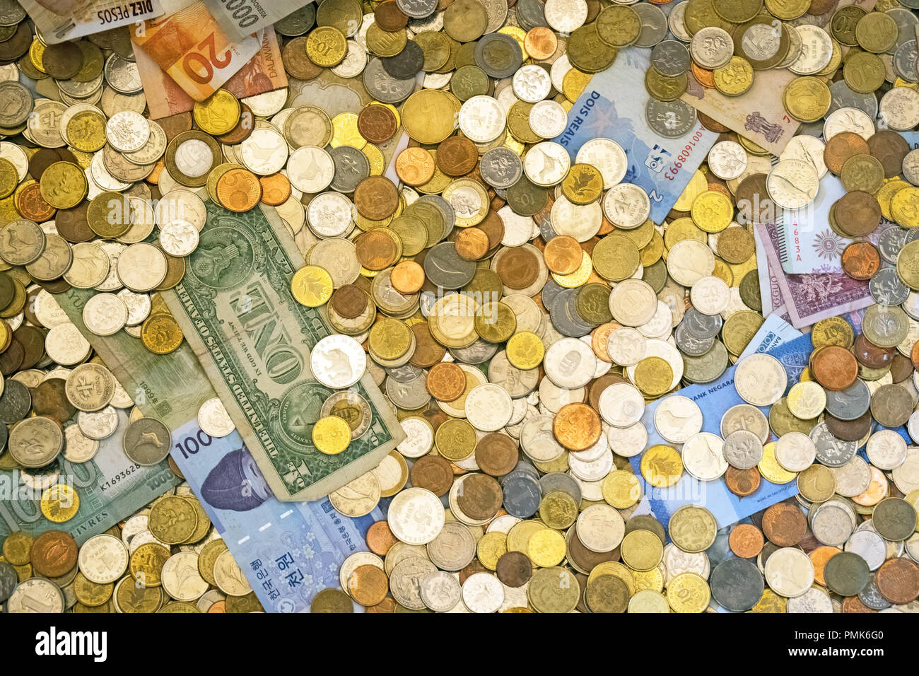 Lots of different money. Banknotes and coins Stock Photo - Alamy