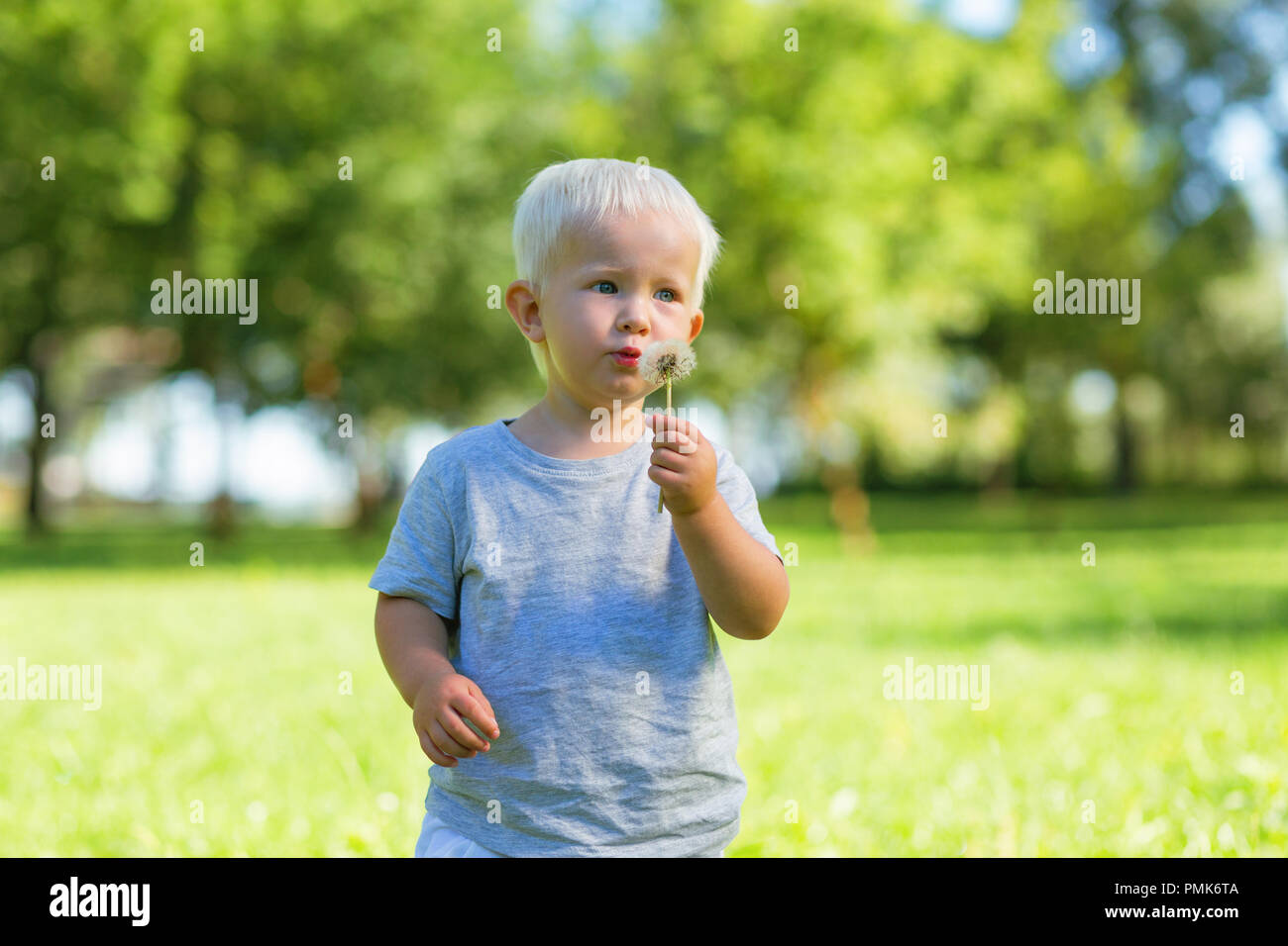 Nice kid enjoying the good weather outside Stock Photo - Alamy