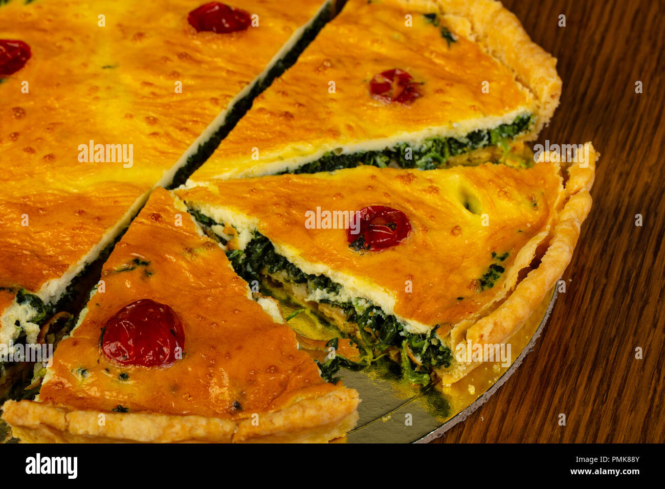 Tasty crusty Pie with spinach Stock Photo - Alamy