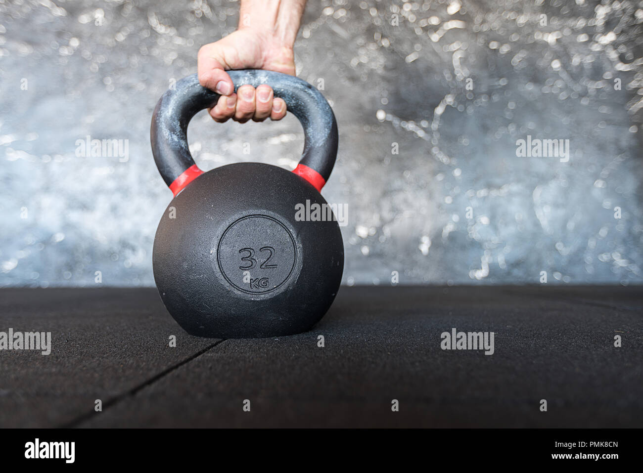 Row of kettlebell or girya weights in a gym weight in a fitness and ...