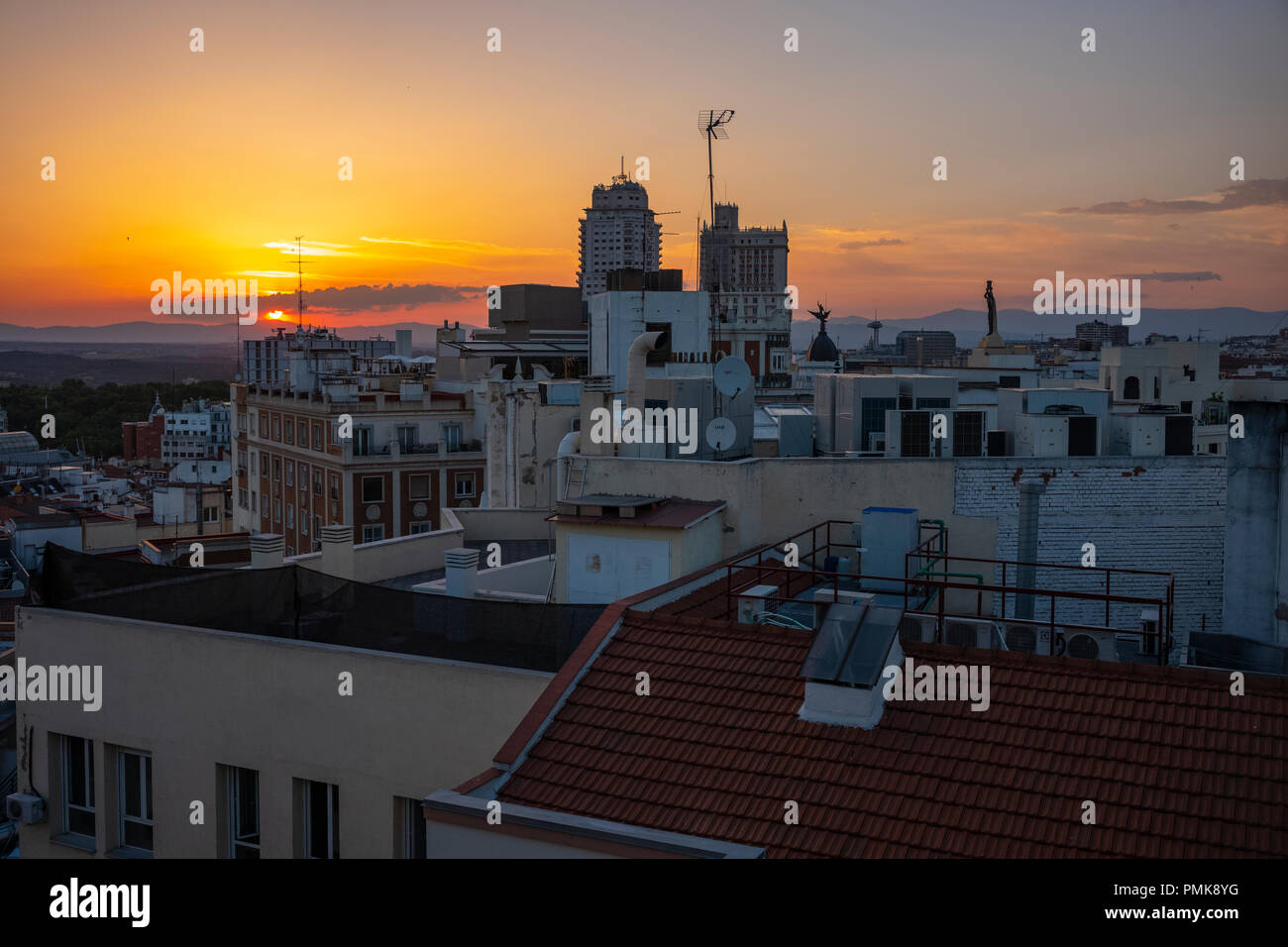 Madrid, Spain, June 21, 2018: The sun sets over the Madrid horizon ...