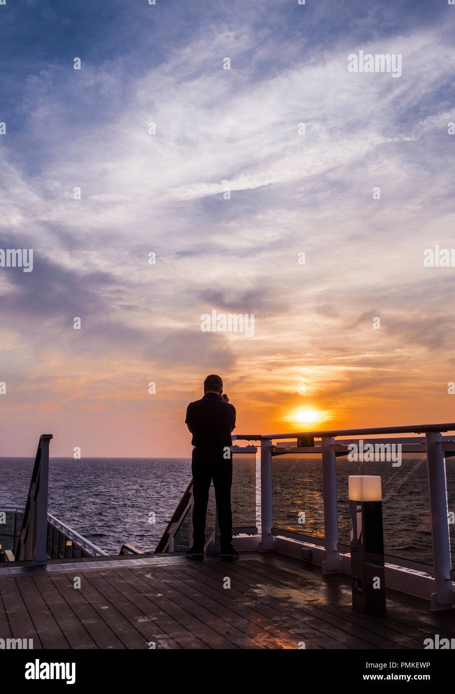 Man standing on ship deck hi-res stock photography and images - Alamy