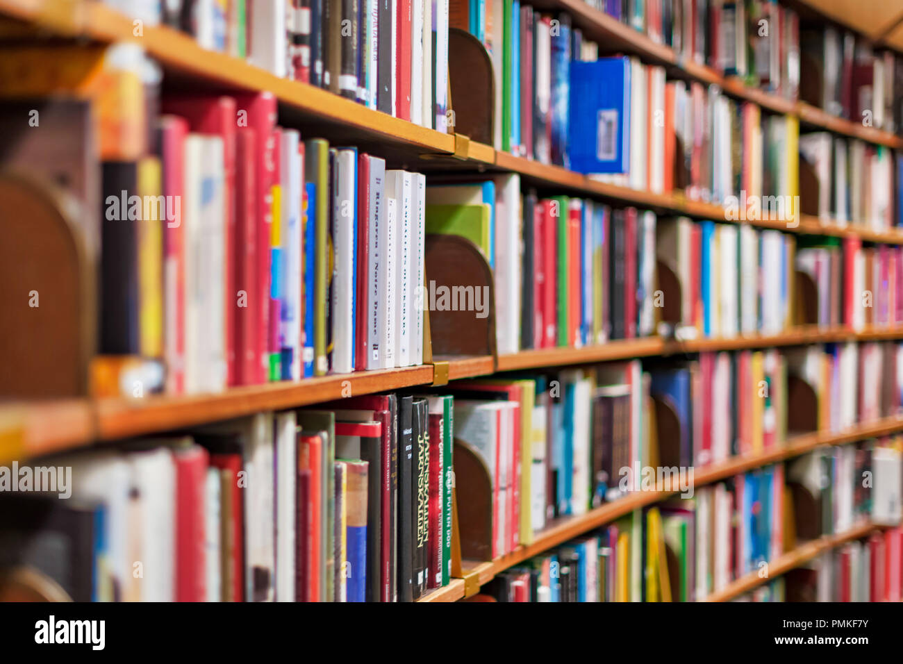 Colorful books in rows at a big bookshelf. Sweden Stock Photo - Alamy