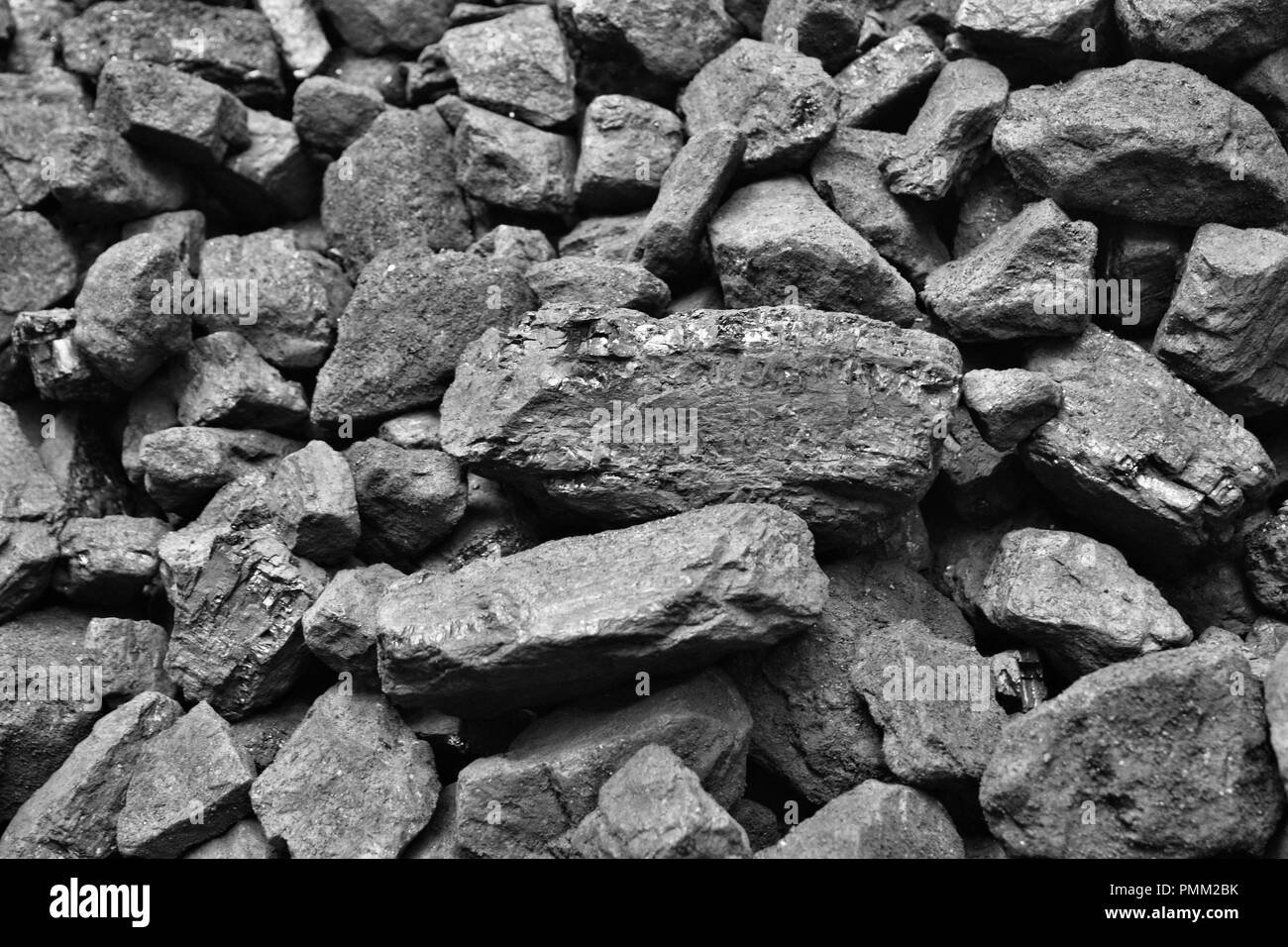 A heap of black natural coal, photo of coal mine background, texture ...